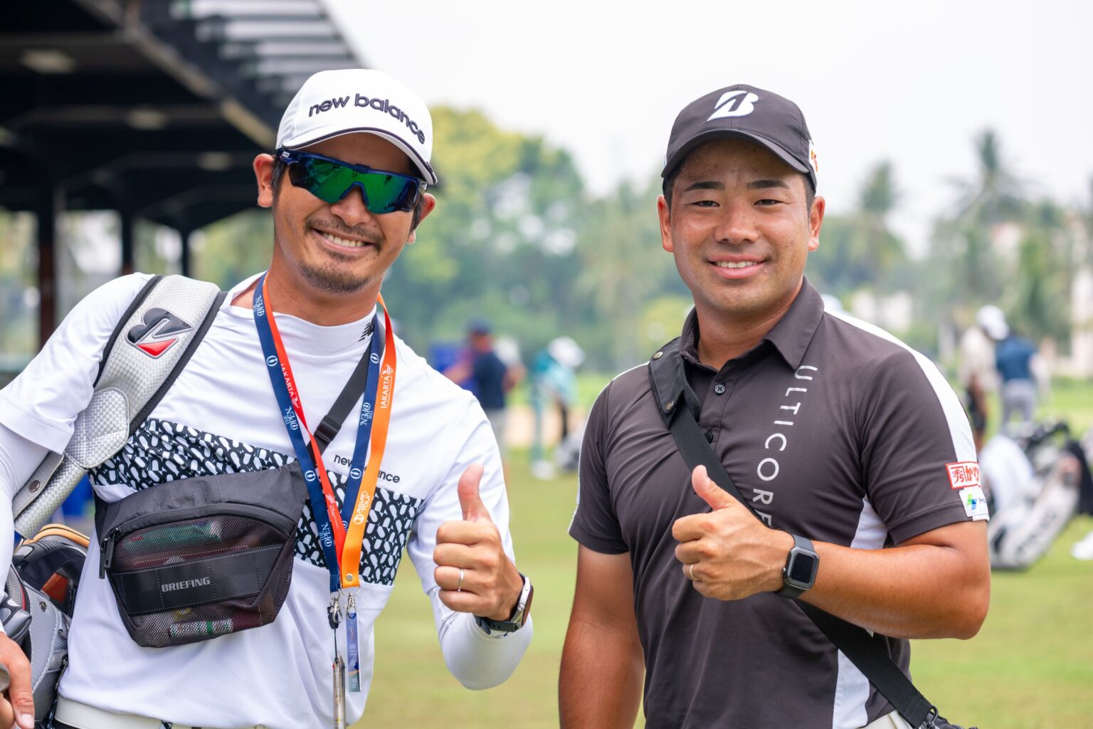 Kazuki Higa pictured with his caddie. Picture by Graham Uden/Asian Tour.