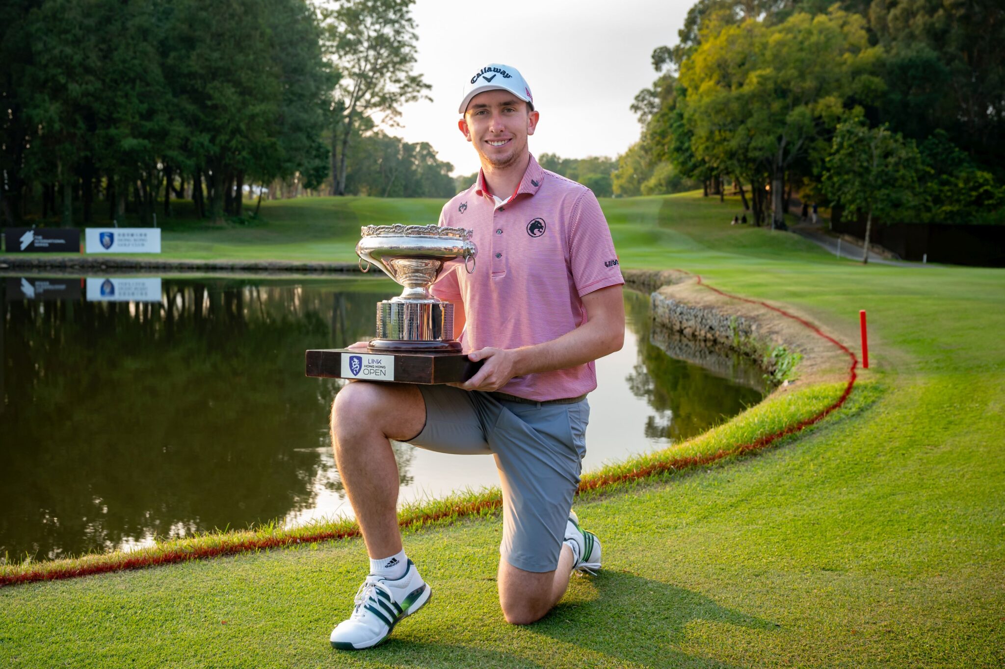 Tom McKibbin pictured with the Link Hong Kong Open trophy last season ...